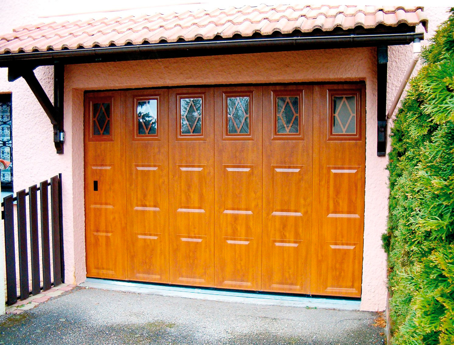 Porte de garage style rustique - Véranda Guilleminot